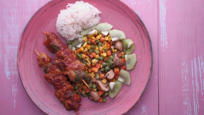 Top View of Chicken, Rice and Vegetable on Plate Stock Video - Video of ...