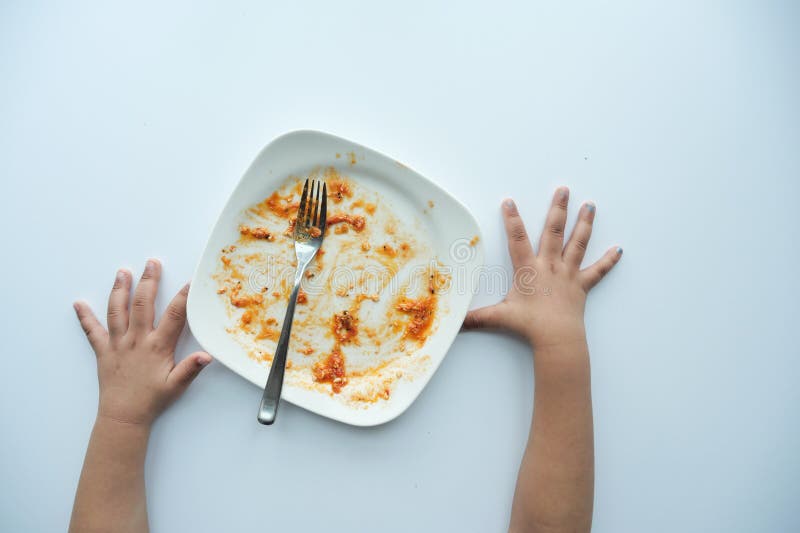 Top View of Child Hand and Empty Plate after Eating on Table Stock ...