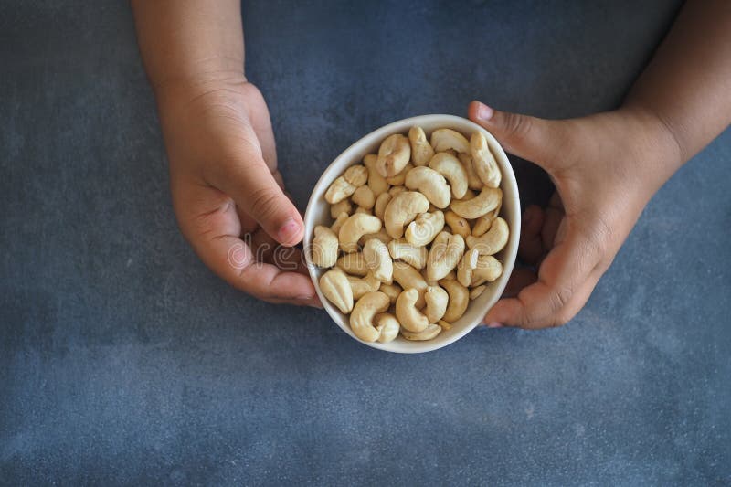 Top View of Child Hand Picks Cashew Nuts , Stock Image - Image of snack ...