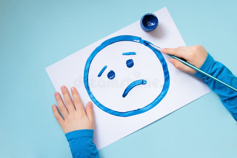 Top View of the Child Hands,drawing Sad Face.Blue Monday Day Concept ...