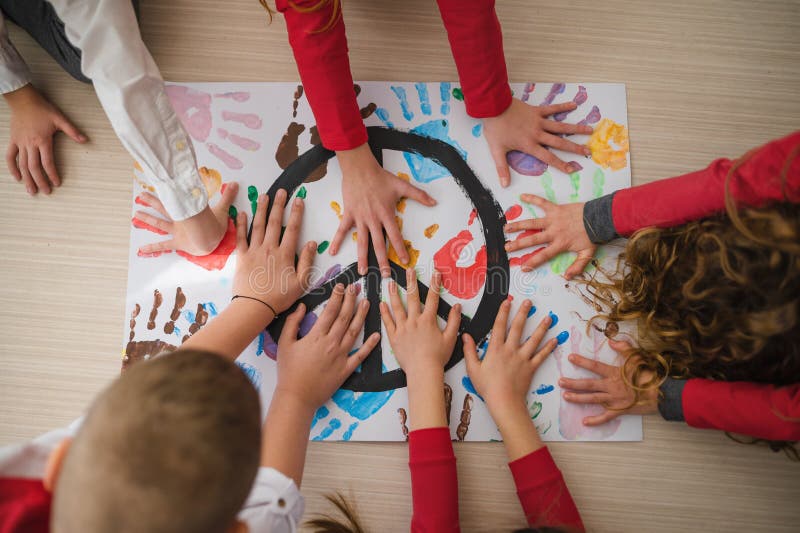 Top View of Children Making a Poster of Peace Sign at School. Stock ...