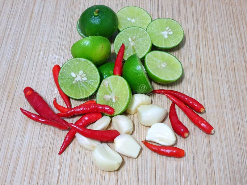 Top View of Chilli, Lemon and Garlic on Wooden Table Stock Photo ...
