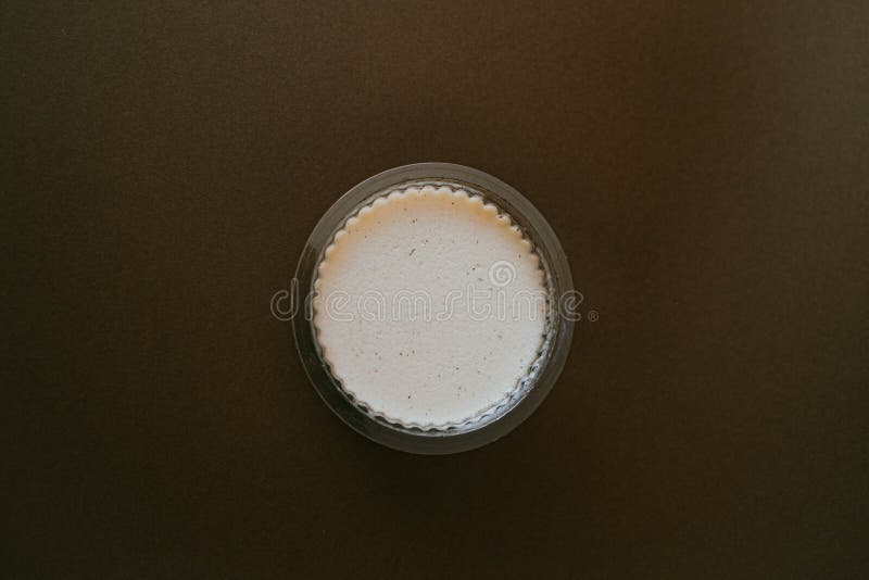 Top View of a Classic White Mousse Isolated on Brown Background Stock ...