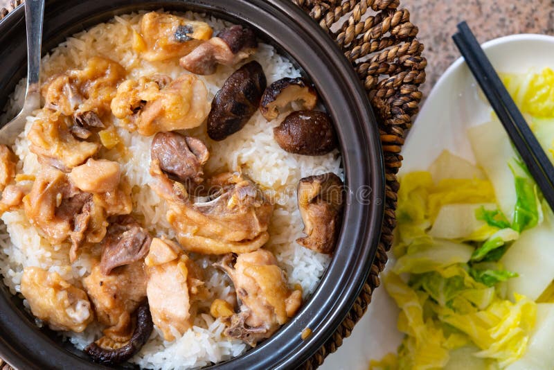 Clay Pot Rice with Chicken and Mushrooms and Cabbage at Horizontal ...