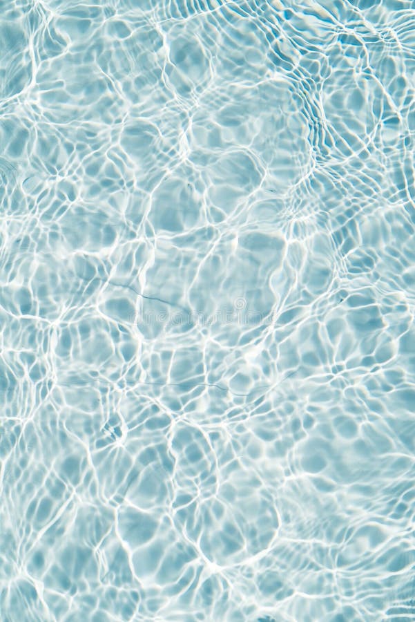 Top View of the Clear Water of a Pool with Patterns of the Sunshine ...