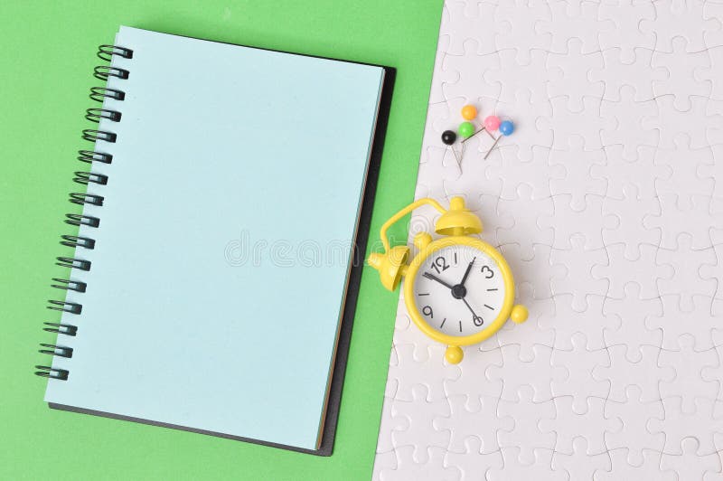 Top View of Clock and Notebook on a White Puzzle Stock Photo - Image of ...