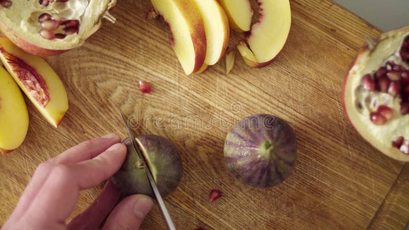 Chef Cutting a Fig on the Chopping Board Stock Image - Image of ...