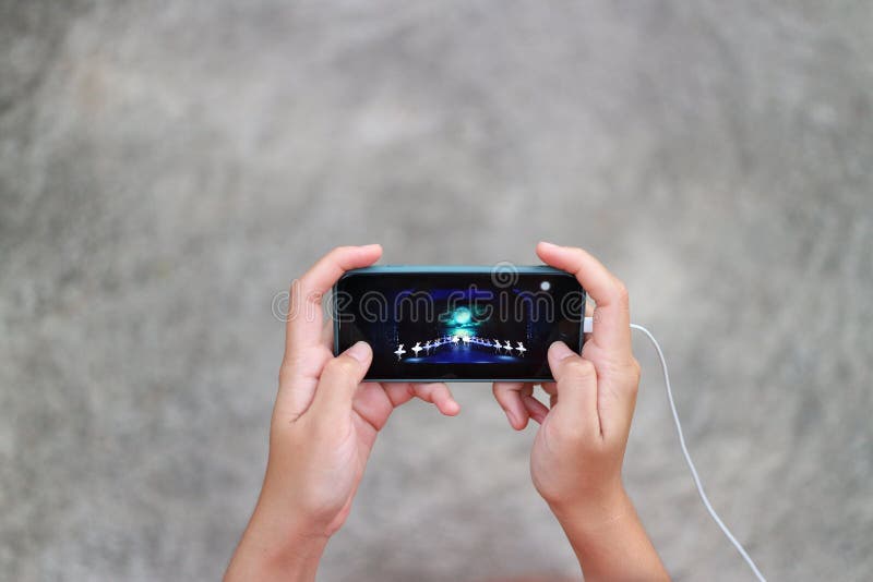 Top View Close-up Shot of People Playing Games with Smartphone ...