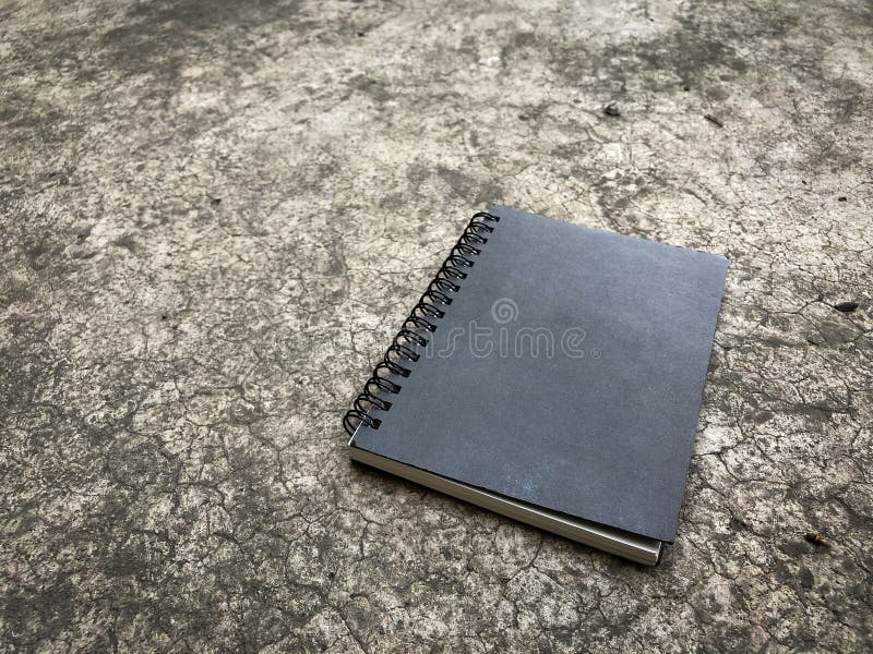 Top View of Closed Black Cover Notebook Stock Photo - Image of letter ...