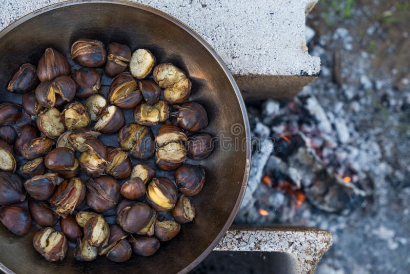Top-view Closeup of Burned Chestnuts Frying in a Pan on Stones Stock ...