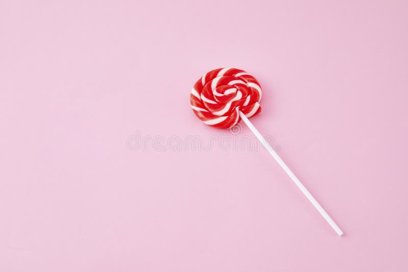 Top View Closeup of Colorful Lollipop on a Pink Background Stock Image ...