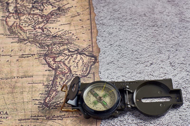 Top View Closeup of a Compass Placed on an Ancient Map Stock Photo ...