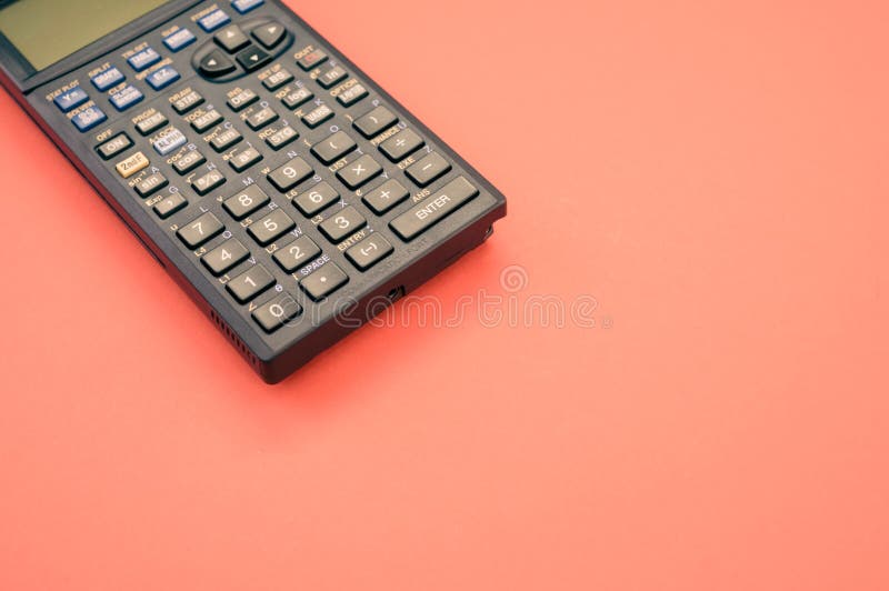 Top View Closeup of a Graphing Calculator Isolated on a Bright Pink ...