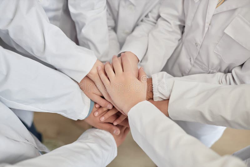 Top View of Group of Children Stacking Hands in Science Class White Lab ...