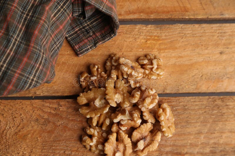 Top View Closeup of a Pile of Walnut Kernels on a Wooden Surface Stock ...