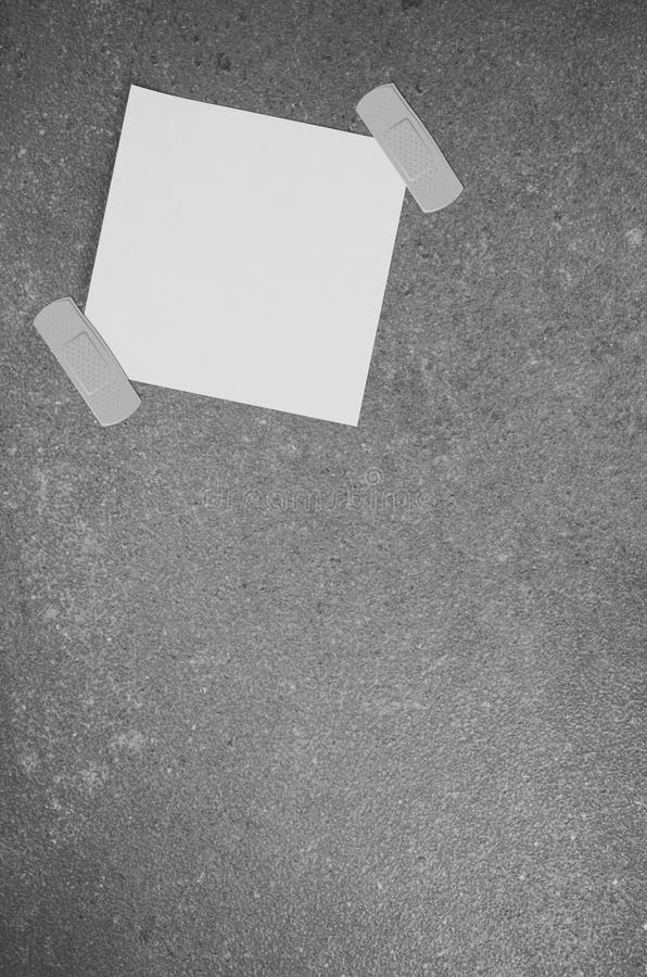 Top View Closeup of a White Memo Paper on a Toned Rough Stone Textured ...