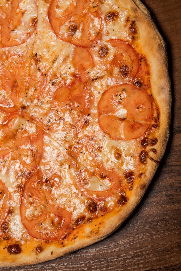 Top View Closeup of Whole Sliced Pizza with Tomato Slices Stock Image ... Top View Closeup of Whole Sliced Pizza with Tomato Slices Stock Image ...