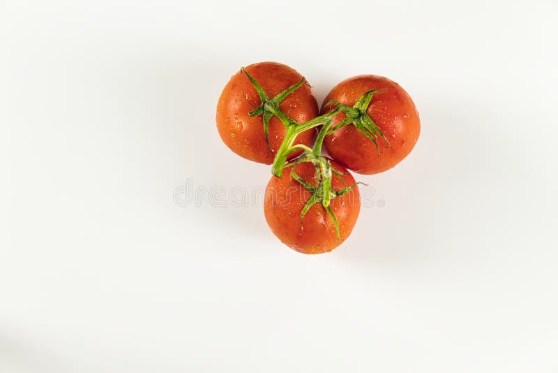 Top View of Cluster of Tomatoes with Drops on White Background Stock ...
