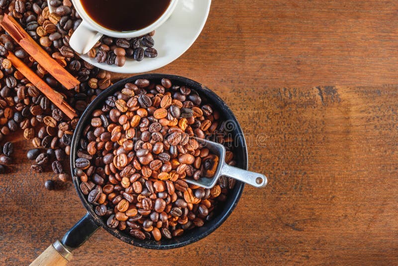 Top View of Coffee Beans Roasted in a Pan and a Coffee Cup Stock Image ...