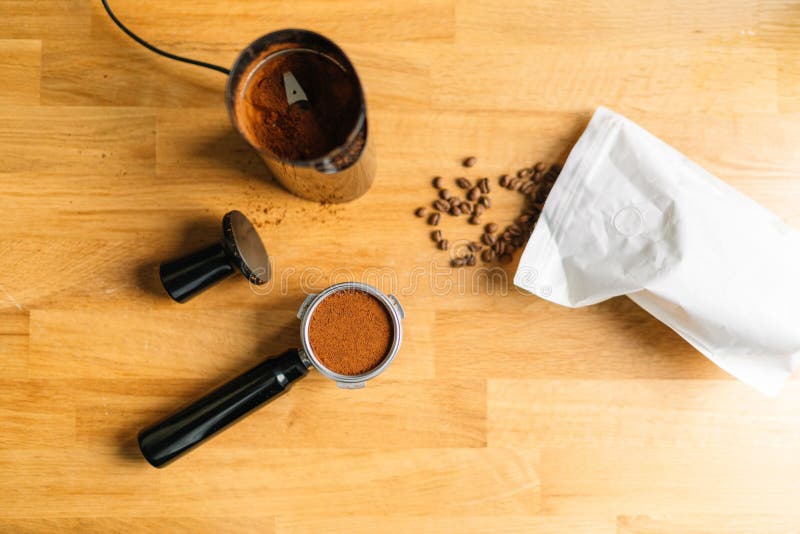 Top View of Coffee Making Essentials Including Grinder, Tamper, and ...