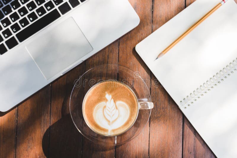 Top View Coffee Notebook and Laptop on Wood Table Vintage Tone. Stock ...