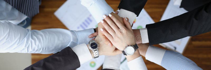 Colleagues Performing Gesture in Order To Prepare for Important ...