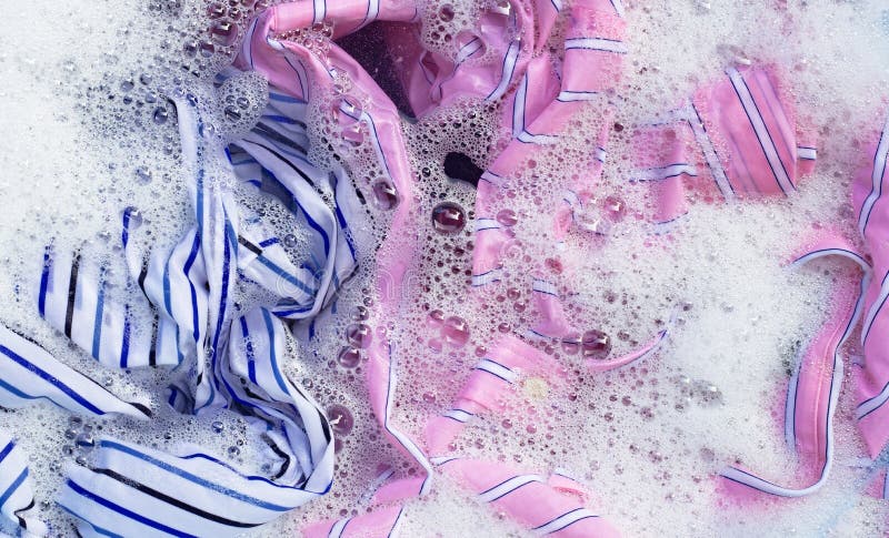 Color Clothes Soak in Powder Detergent Water Dissolution. Laundry ...