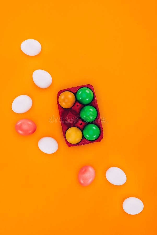 Top View of Colored Easter Eggs in Red Egg Tray Stock Image - Image of ...