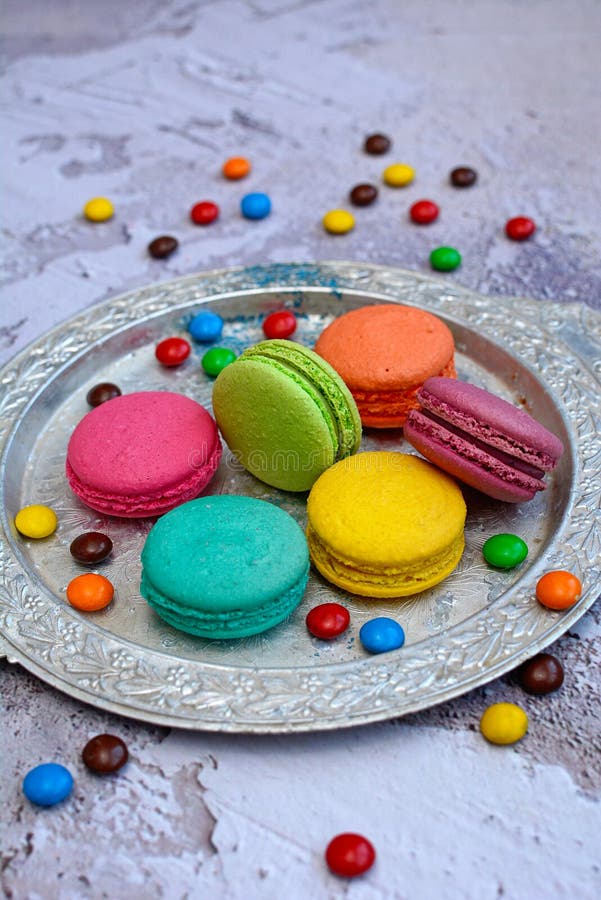 Top View of Colored Macarons on a Silver Platter. Vertical Stock Photo ...