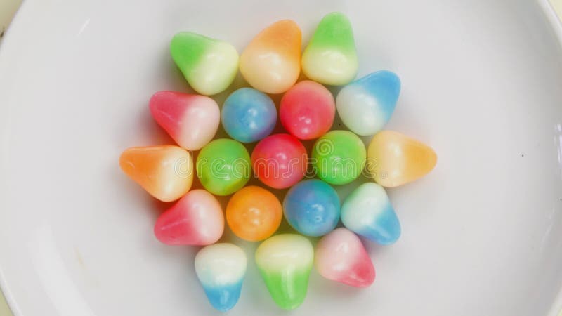 Top View of Colorful Crispy Jelly in White Ceramic Plate. Stock Video ...