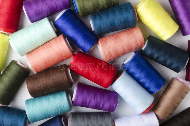 Top View of Colorful Bobbins on the White Surface.Different Colors of ...