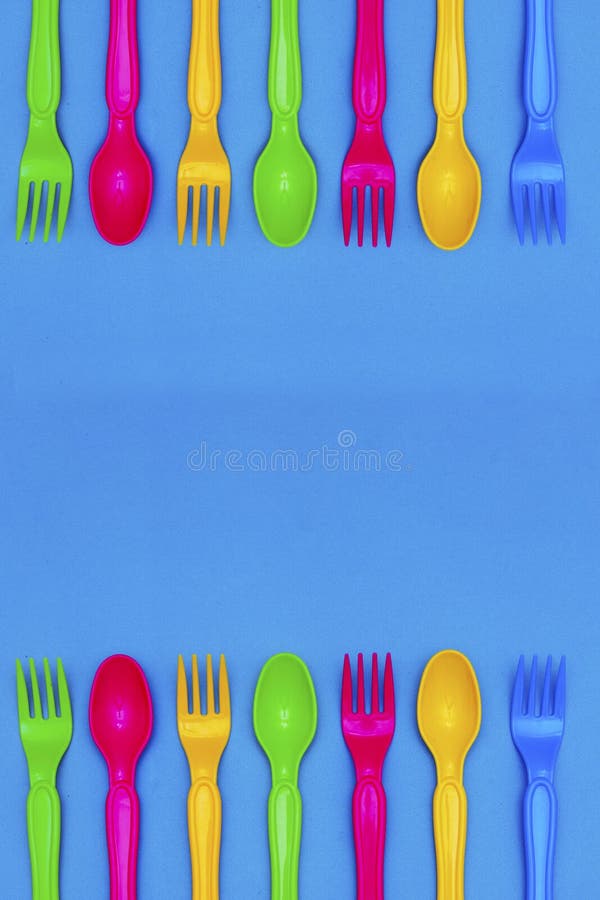 Top View of Colorful Spoon and Fork Element on Blue Color Table.flat ...