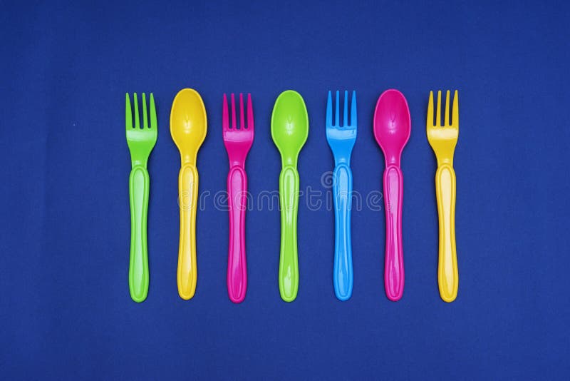 Top View of Colorful Spoon and Fork Element on Blue Color Table.flat ...