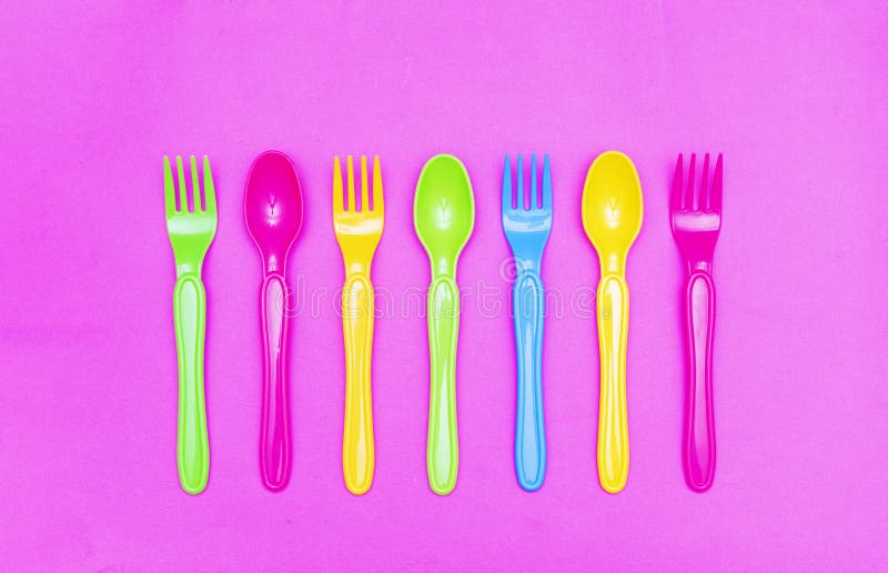 Top View of Colorful Spoon and Fork Element on Red Color Table.flat Lay ...