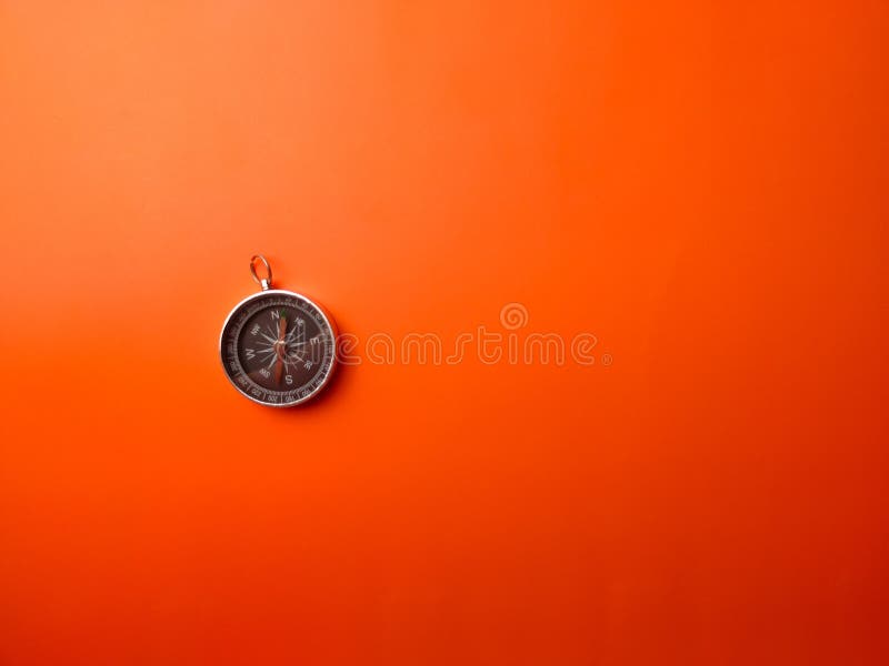Top View Compass on a Orange Background Stock Photo - Image of traveler ...