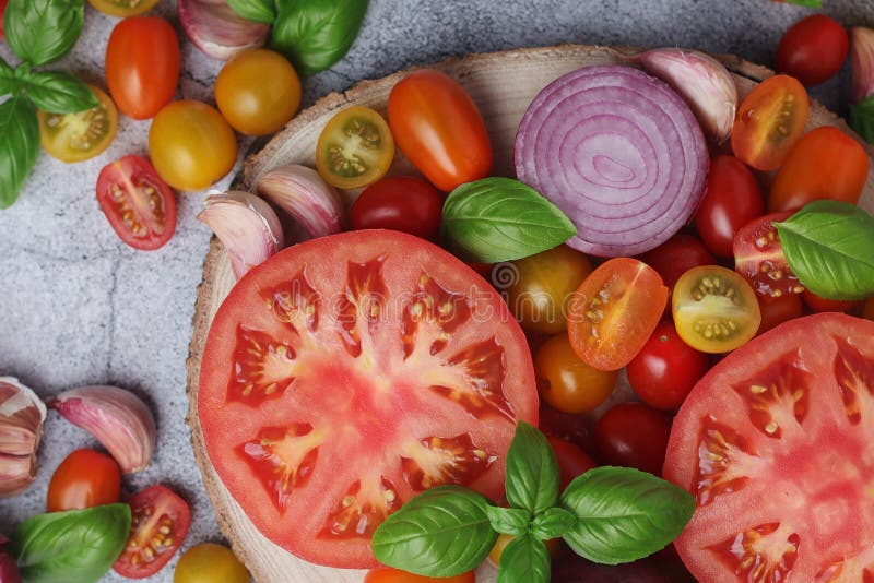 Composition of Different Tomatoes, Onion, Basil and Garlic Stock Image ...