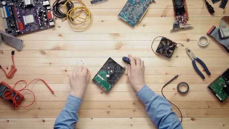 Top View Computer Technician Repairing Hard Drive at Wooden Desk with ...