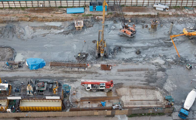 Top View of Construction with Cranes and Excavators and Heavy Equipment ...