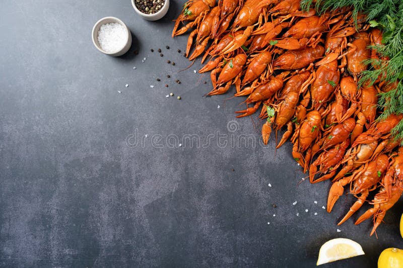 Top View of Cooked Crawfish with Lemons and Spices on Dark Cement ...