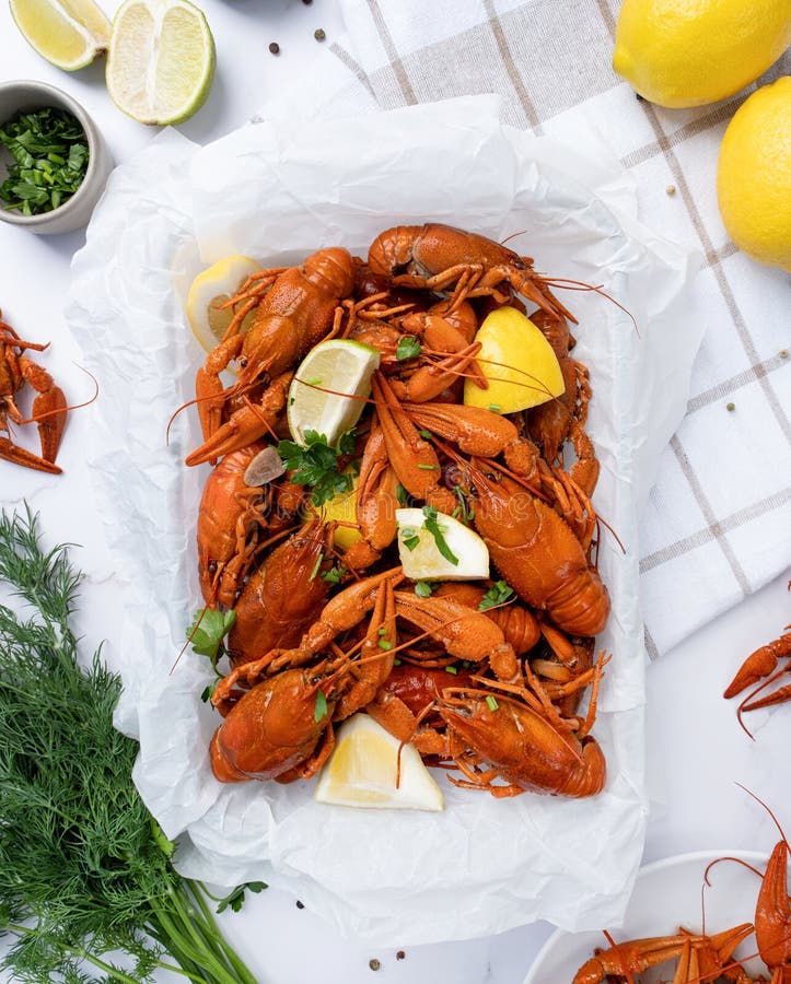 Top View of Cooked Crawfish Platter with Lemons and Spices Stock Photo ...