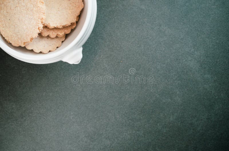 Top View of Cookies on a White Bowl on a Rough-textured Surface with ...