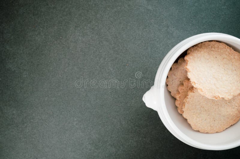 Top View of Cookies on a White Bowl on a Rough-textured Surface with ...