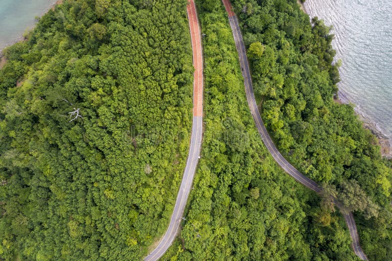 Top View of Countryside Road Passing through the Green Forrest and ...