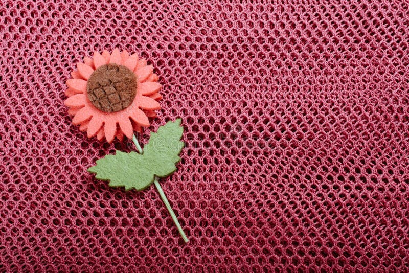 Top View of a Craft Flower Made of Felt on a Mesh Surface Stock Photo ...