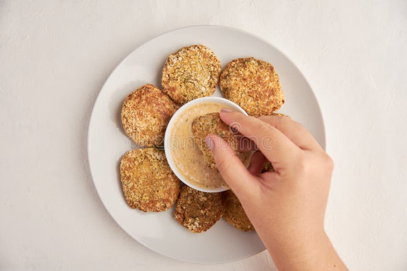 Top View of Crispy Fried Cutlets with Sauce on a White Surface. Stock ...
