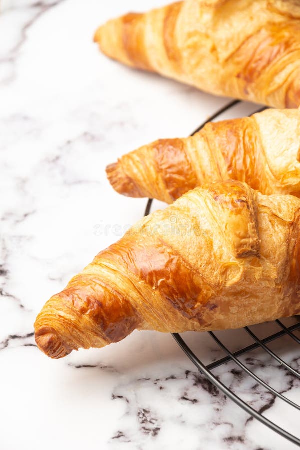 Top View of Croissants on Wire Rack on Marble Table Stock Image - Image ...