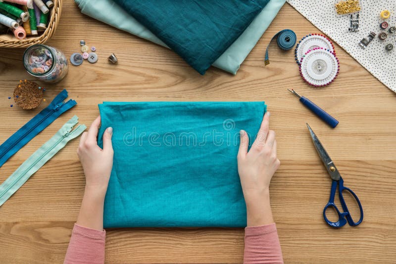 Top View of Cropped Female Hands Folding Fabric Stock Image - Image of ...