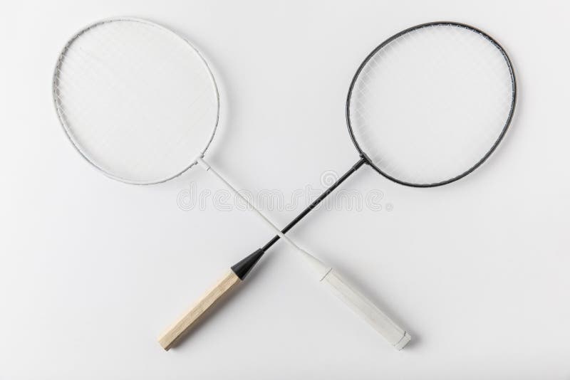 Crossed Badminton Rackets on White Surface Stock Photo - Image of ...
