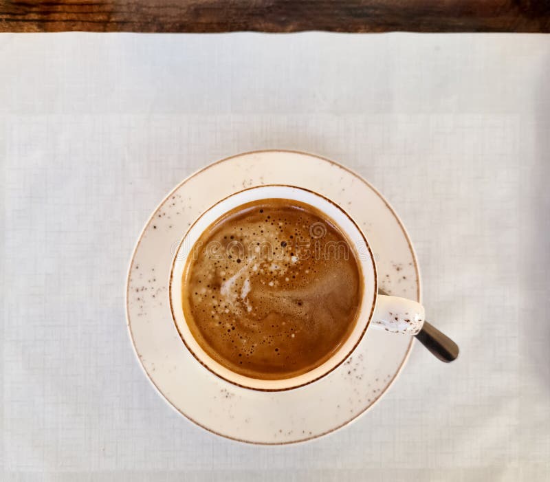 Top View of a Cup of Cafe Crema on a White Doily Stock Photo - Image of ...