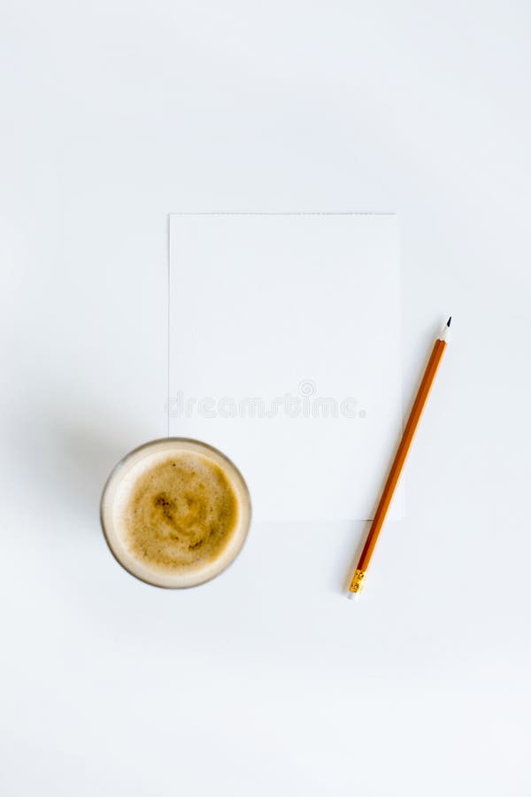 Top View of Cup of Coffee on White Paper with Pencil Stock Photo ...